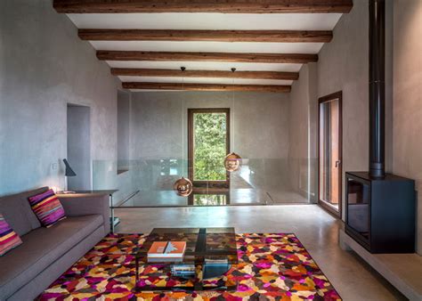 Weathered Steel And Stone Combine In Zest Architectures Restored Farmhouse