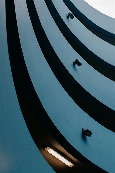 Curved Building Facade With Lights Photo Free City Image On Unsplash