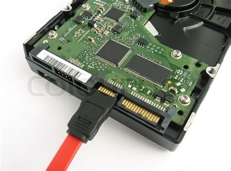 Computer Hard Disk Drive Hdd And Red Cable Connector On White