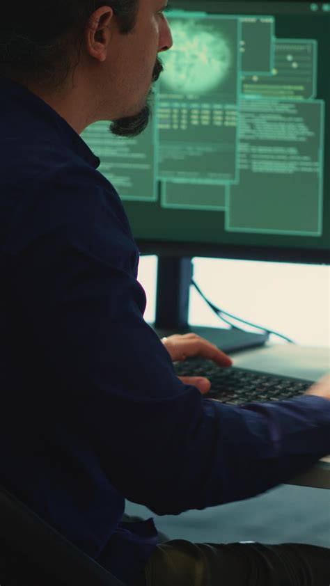 Vertical Cyber Security Experts In A Governmental Hacking Room Working On Securing Networks