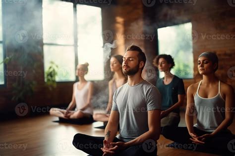Group Meditation In Yoga Studio Breath Exercise Men And Women