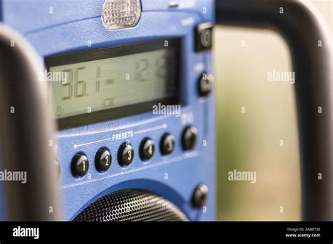 Close Up Of A Blue Portable Radio Tuning Display Showing Fm Radio