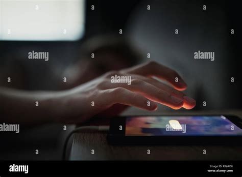 Hitting The Snooze Button Stock Photo Alamy