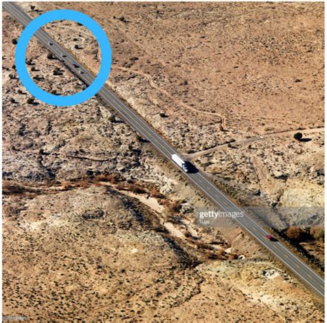 This Is NOT An Image Of A Road Built To Avoid Cutting Down One Tree In A Desert Fact