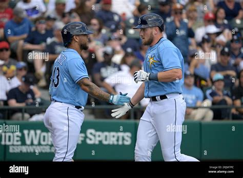 Tampa Bay Rays Luke Raley Right Is Congratulated By Harold Ramirez