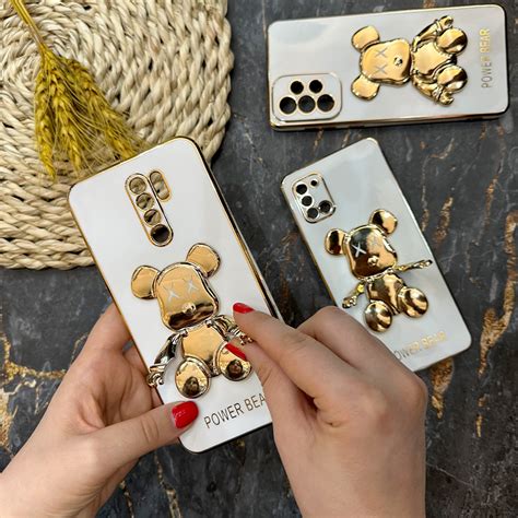 قاب گوشی سامسونگ ژله ای My Case مای کیس مدل خرس تدی طلایی برجسته محافظ لنز دار پاپ سوکت دار سفید