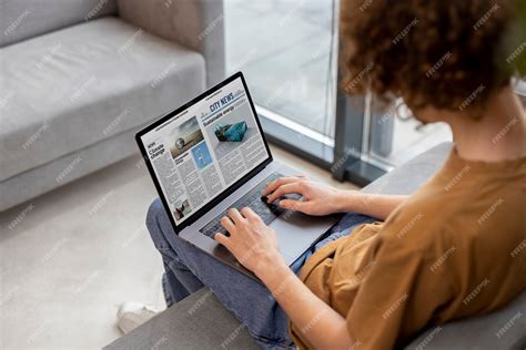 Free Photo High Angle Man Reading Digital Magazine