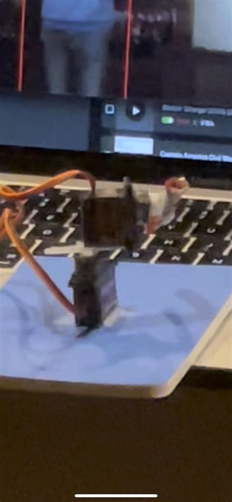 Need Larger Servo Motors That Can Handle Weight Of 2 Pound Object Paper On Right Is Placeholder