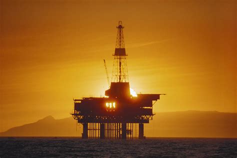 Offshore Oil Rig At Sunset Photograph By Jack Fields Pixels