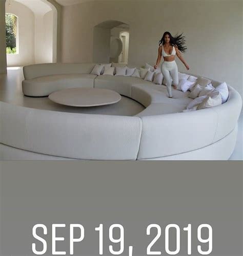 Kim Kardashian Bouncing Around Her Giant Circular Couch In A Teeny Tiny