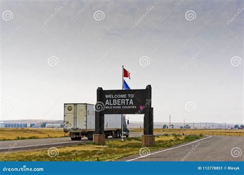Welcome To Alberta Wild Rose Country Sign Just After Crossing The