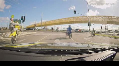 Dirt Bike Riders Encircle Police Officers During Arrest In Victorias