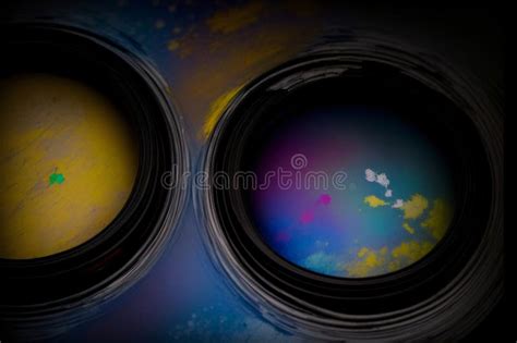 A Close Up Of Two Circular Objects With A Sky In The Background