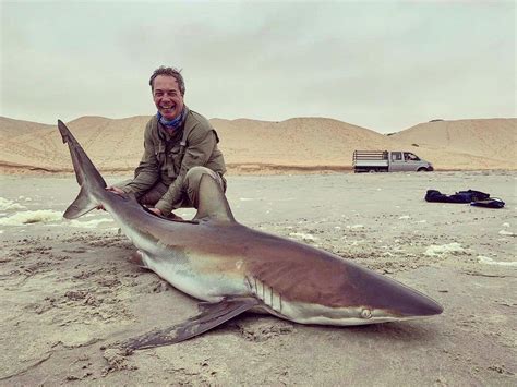 Nigel Farage Criticised For Posting Photo Of Himself With Hooked Shark