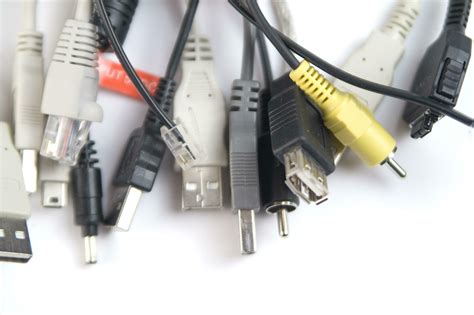 A Hand Holding Several Different Types Of Cables 27094475 Stock Photo At Vecteezy