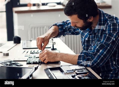 Laptop Disassembling With Screwdriver Side View Stock Photo Alamy