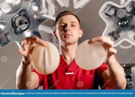 The Surgeon Shows Different Types Of Silicone Implants Breast Augmentation Surgery Stock Image