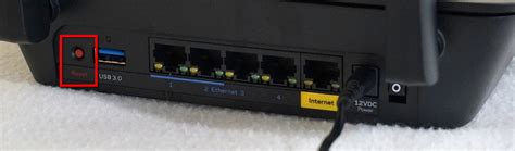 Red Button On Back Of Router