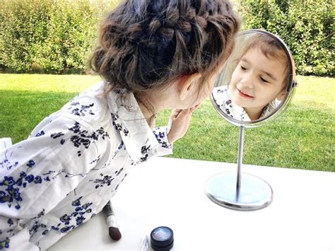 Premium Photo Close Up Of Girl Looking In Mirror