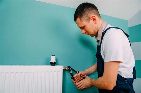 Premium Photo Repair Heating Radiator Closeup Man Repairing Radiator