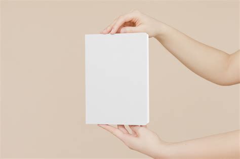 Free Book In Man Hands Mockup Mr Mockup