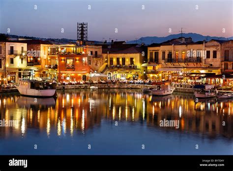 The Old Venetian Harbor Of Rethymno Town Around The Blue Hour Stock