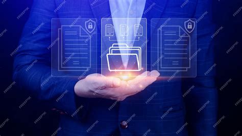 Premium Photo Document Management System Dms Being Setup It Consultant Working On Laptop