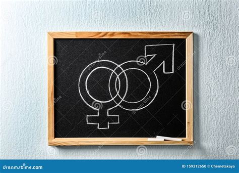 Small Blackboard With Drawn Gender Symbols On Wall Sex Education Stock Photo Image Of
