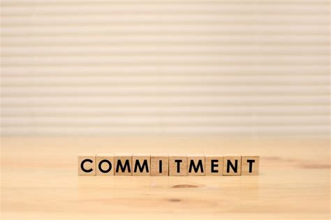 Premium Photo Commitment Word Text Typography Written On Wooden