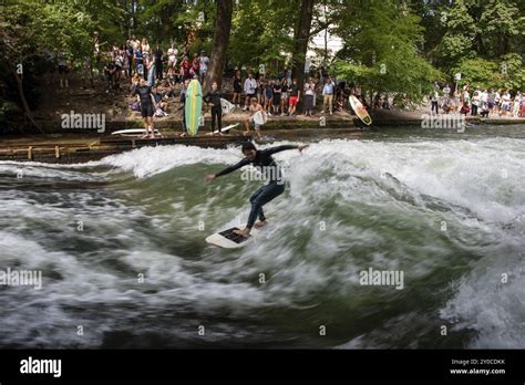 Surfers In The Eisbach Numerous Onlookers On The Banks Eisbach Wave