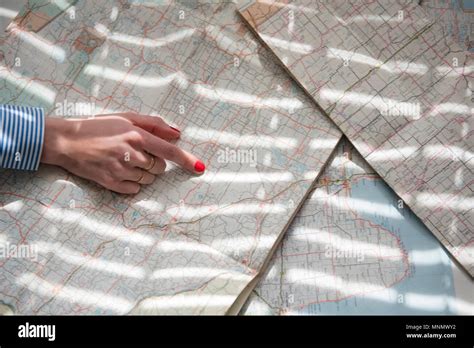 Woman Pointing To Map Stock Photo Alamy