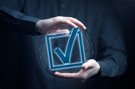 Businessman Holding The Checkbox Icon The Concept Of Making Decision