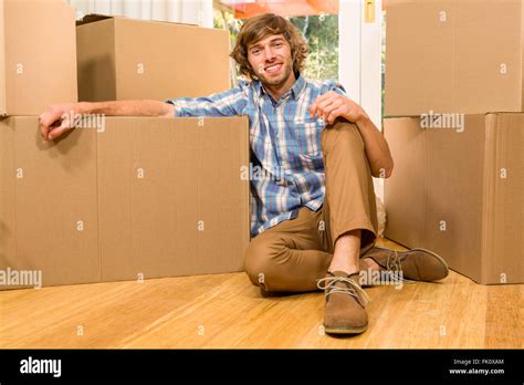 Handsome Man Posing With Moving Boxes Stock Photo Alamy
