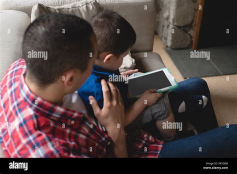 Father Son Using Touchscreen Tablet Hi Res Stock Photography And Images Alamy
