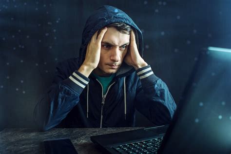Premium Photo Hacker Tries To Bypass The Protection And Hack Into The System To Commit A