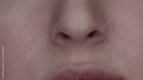 Video Extreme Close Up Of Enlargement Of Nose Nostrils Of Woman White Skin Girl Opens And