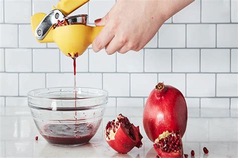 خرید و قیمت دستگاه آب انار گیر دستی آراد برندینگ