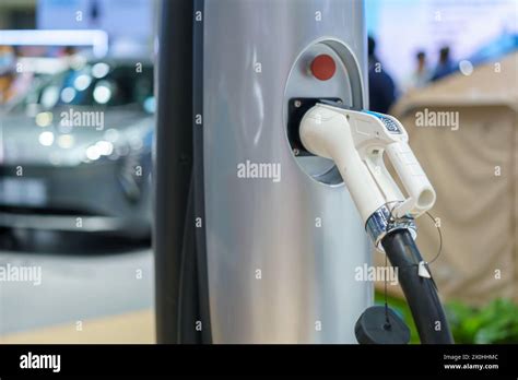 Swift Power Surge Chargers Nestled In A Bustling Car Park These Sleek And Efficient Chargers