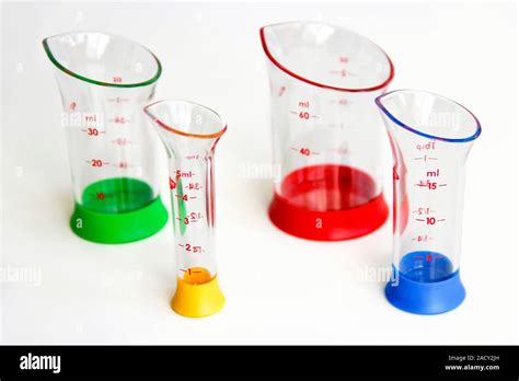 Laboratory Measuring Flasks Various Coloured Flasks Used To Measure Liquids In A Lab Stock