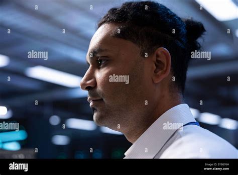 It Specialist Walking Through Operational Server Rows In Computer Network Security Data Center