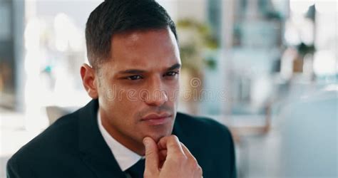 Thinking Serious And Business Man At A Computer Working And Reading Website Analytics Data