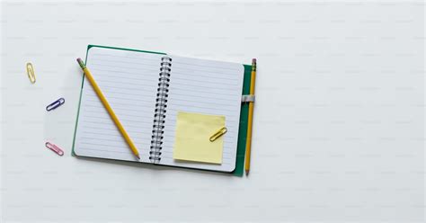 메모장과 연필이 있는 노트북 사진 Unsplash의 노트 용지 이미지