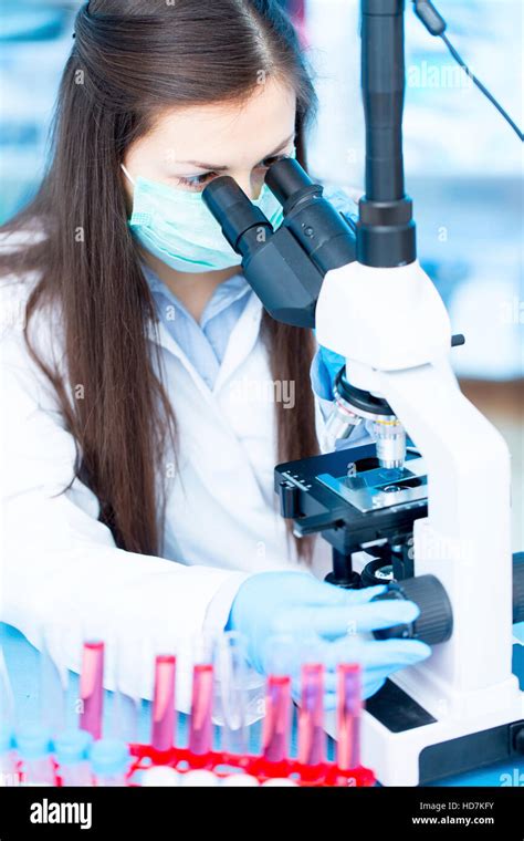 MODEL RELEASED Girl Using Microscope Stock Photo Alamy