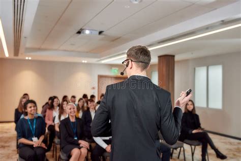 Next Generation Leadership Young Male Speaker With Headset And Laser
