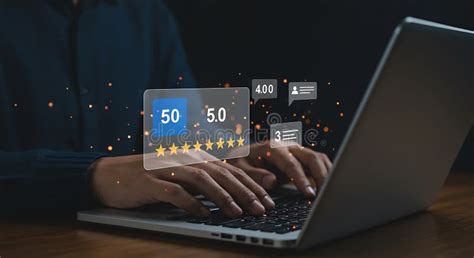 Hands Typing On A Laptop Keyboard With Digital Overlay Graphics Showing Rating Stock