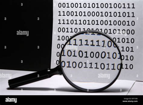 Magnifying Glass On Binary Background Stock Photo Alamy