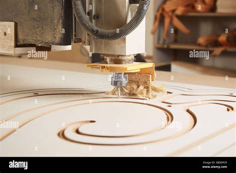 Numerically Controlled Woodworking Machine Cuts Rounded Complex Lines