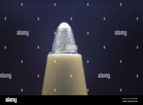Macro Photo Of Ballpoint Pen Tip With Dark Grey Background Extreme