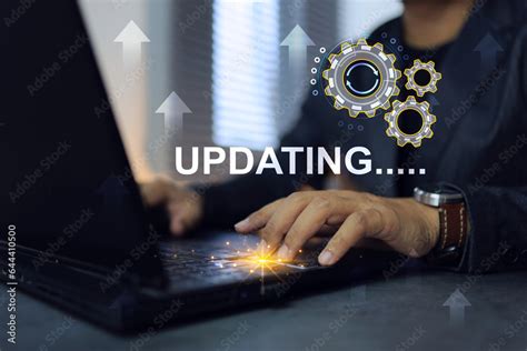 Businessman Updating Information Via Laptop Or Software Update For Better Performance And