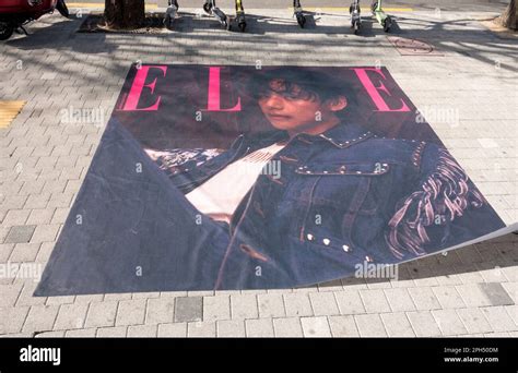 Bts V Mar 26 2023 A Placard Showing Bts V Featured In Elle Koreas April Issue Is Seen After